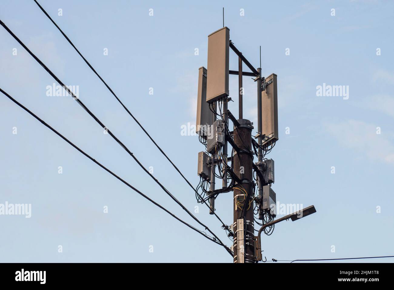 Cell site base station. Telecommunication tower. Wireless communication antenna transmitter ...