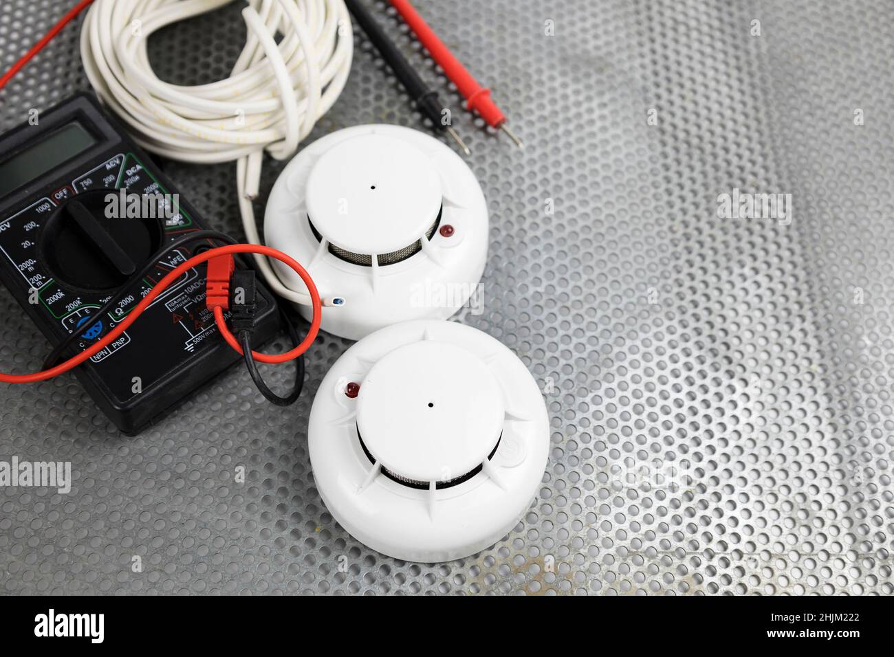 Installation of a new fire alarm system, smart home Stock Photo - Alamy