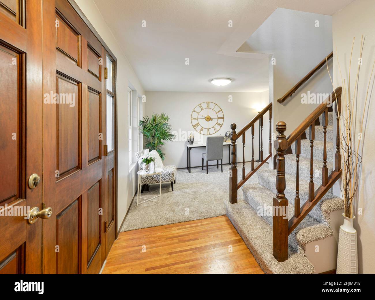 Modern residential front entrance and living room interior Stock Photo ...