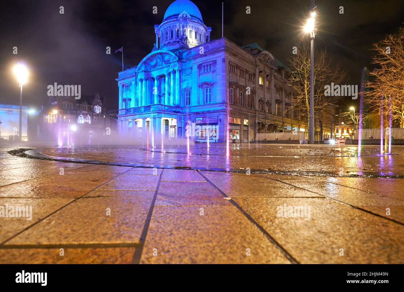 City hall illuminated at night Stock Photo - Alamy