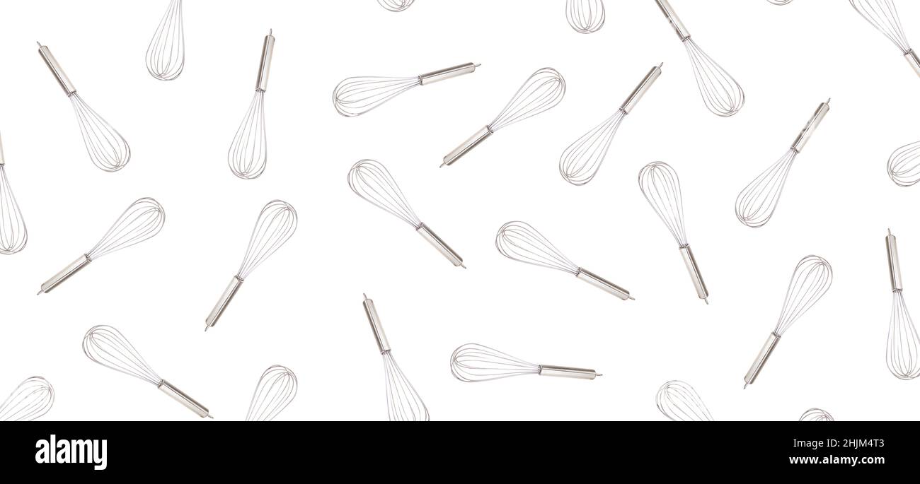 Pattern metal kitchen whisk for whisking on a white isolated background ...