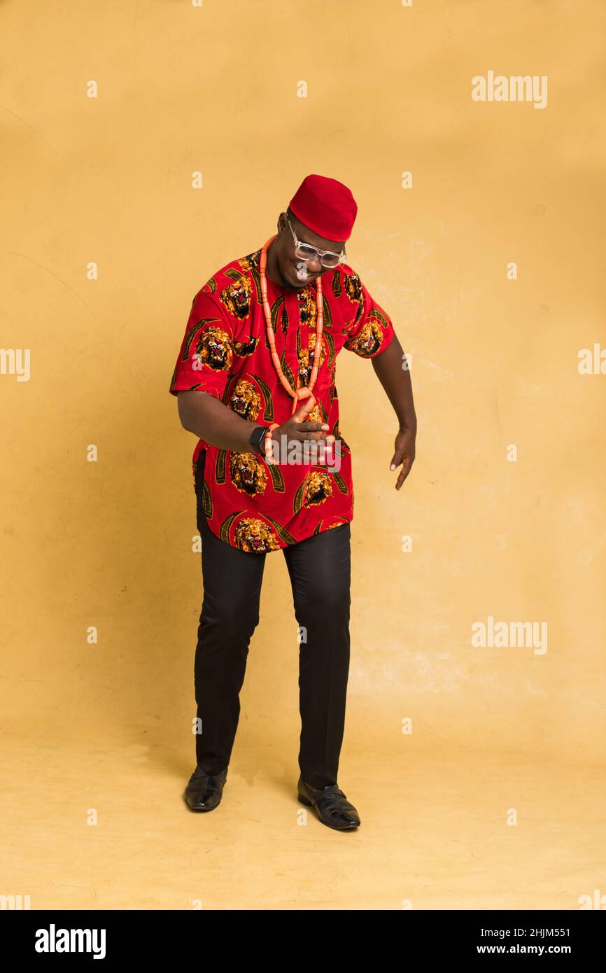 Igbo Traditionally Dressed Business Man Standing Dancing Stock Photo ...