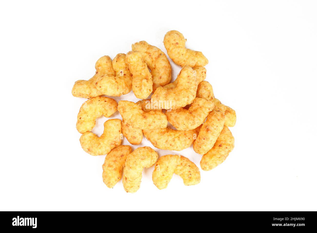 Peanut flips isolated on white background. Pile of snack food close-up ...