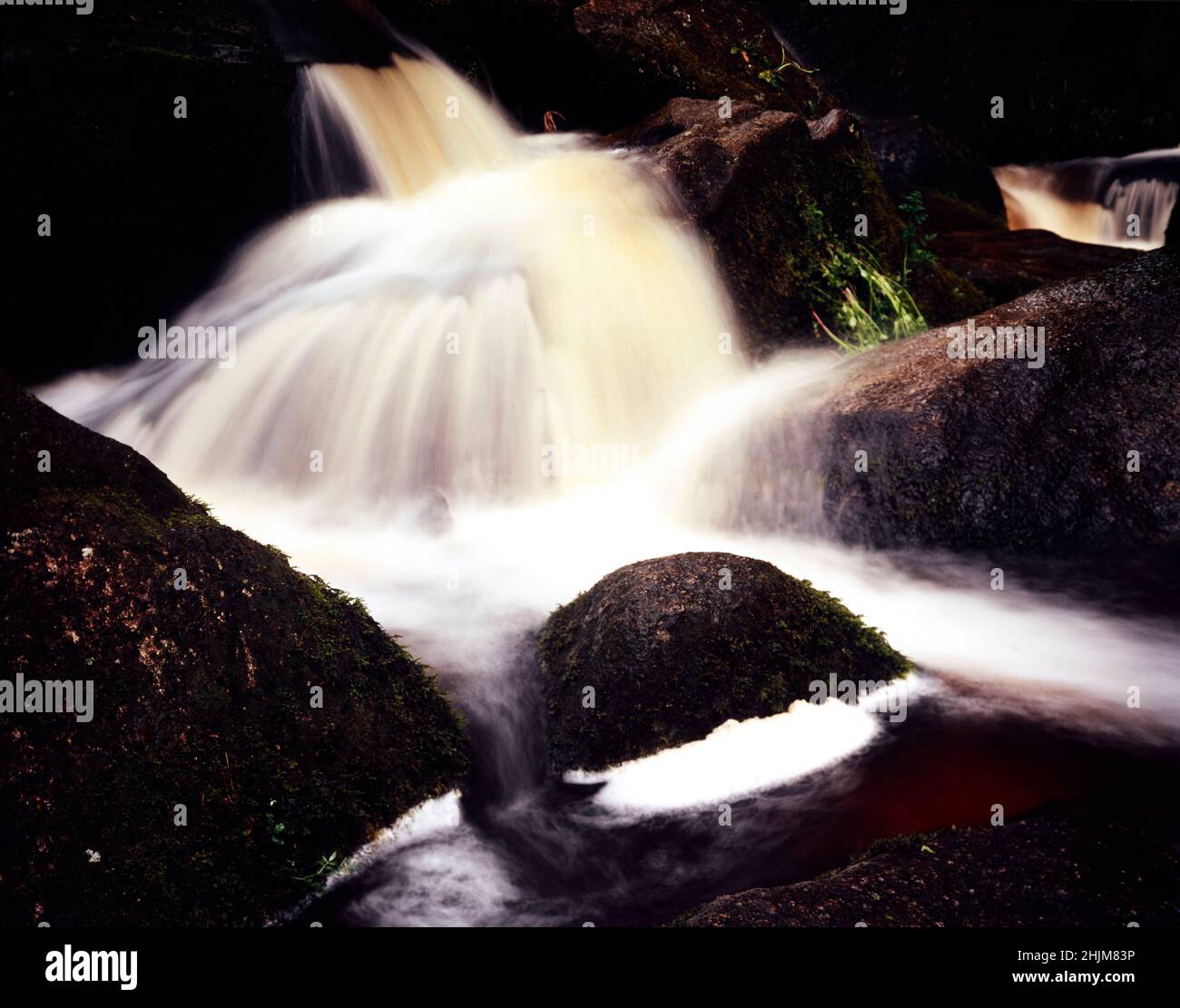Superb Becky Falls, Water rushing through ancient woodland, natural ...
