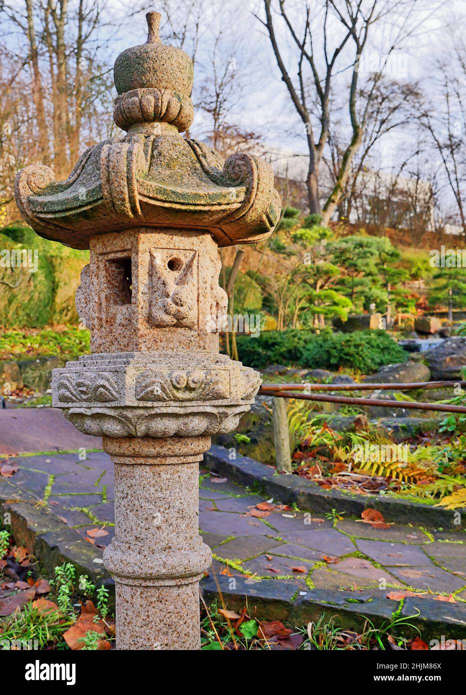Stone lantern in the Japanese style in japanese style garden Stock ...