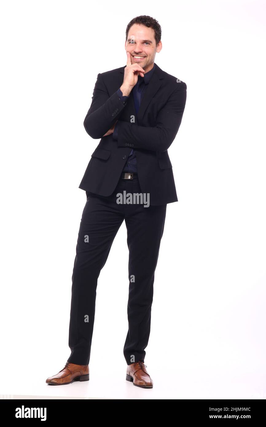 Man standing in front of a white background Stock Photo - Alamy