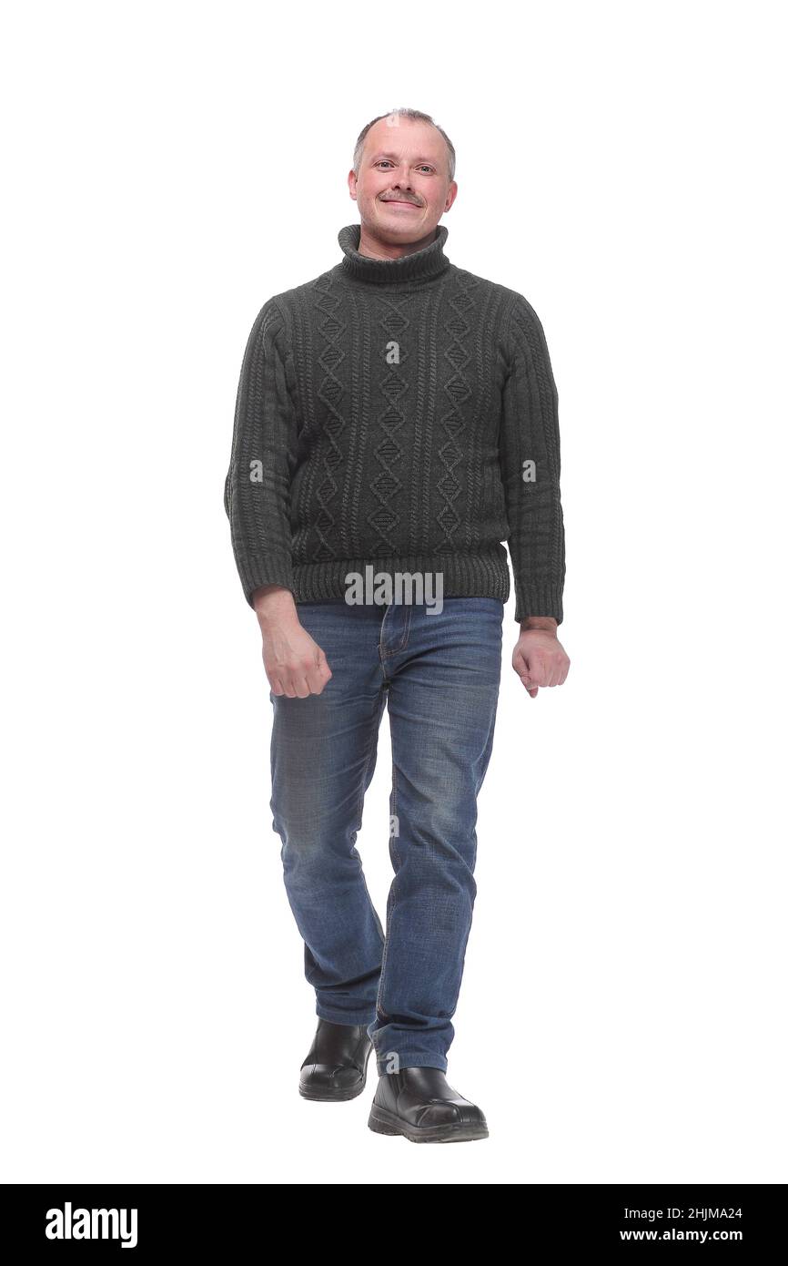 Full length picture of a casual senior man walking towards the camera ...