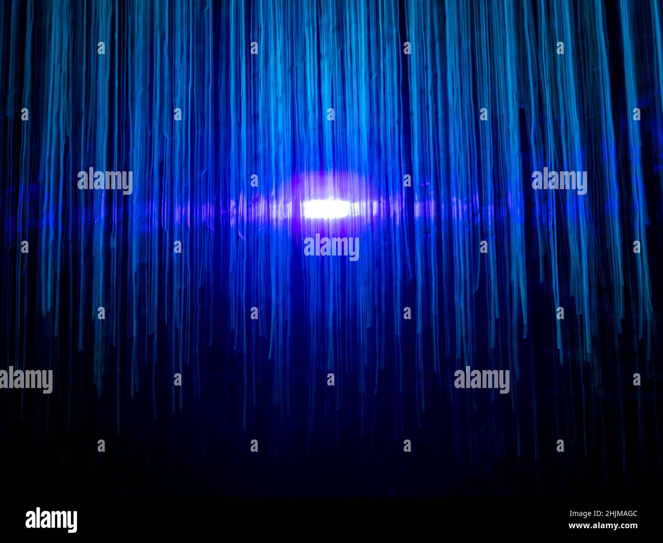 Cyan Vertical Lines with a Black Background and Reflectors Stock Photo ...