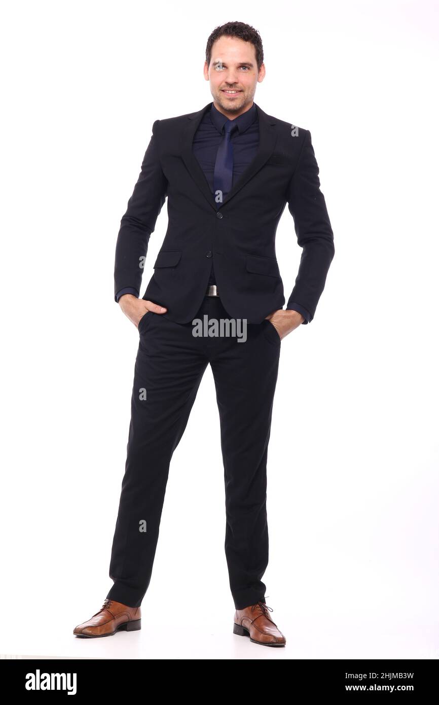 Man standing in front of a white background Stock Photo - Alamy