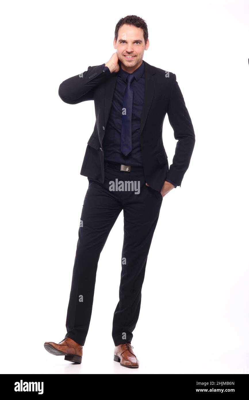 Man standing in front of a white background Stock Photo - Alamy