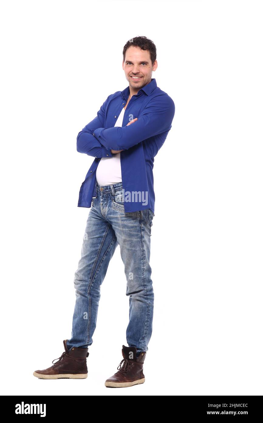 Man standing in front of a white background Stock Photo - Alamy