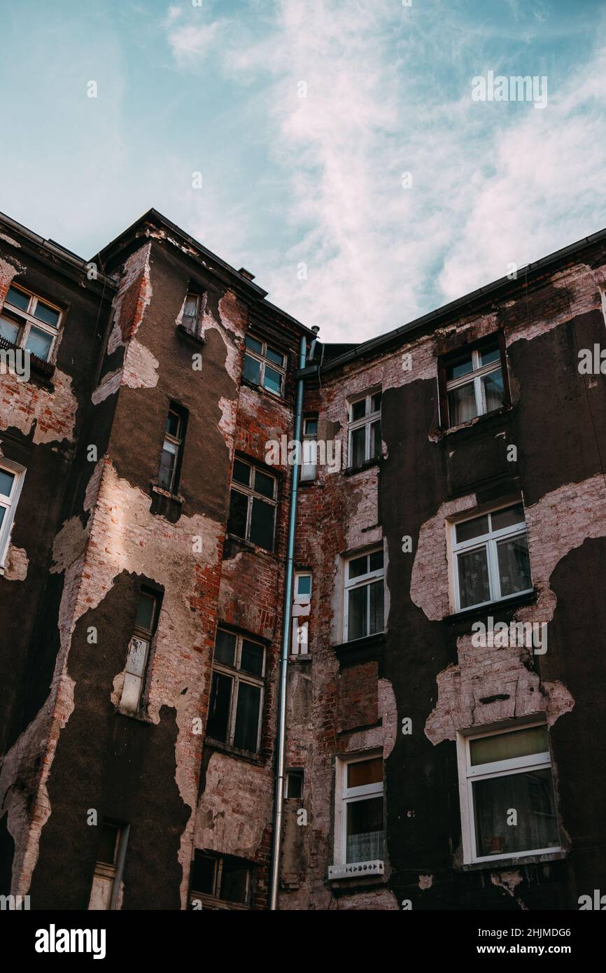 Vertical shot of an old building with a weathered facade Stock Photo ...