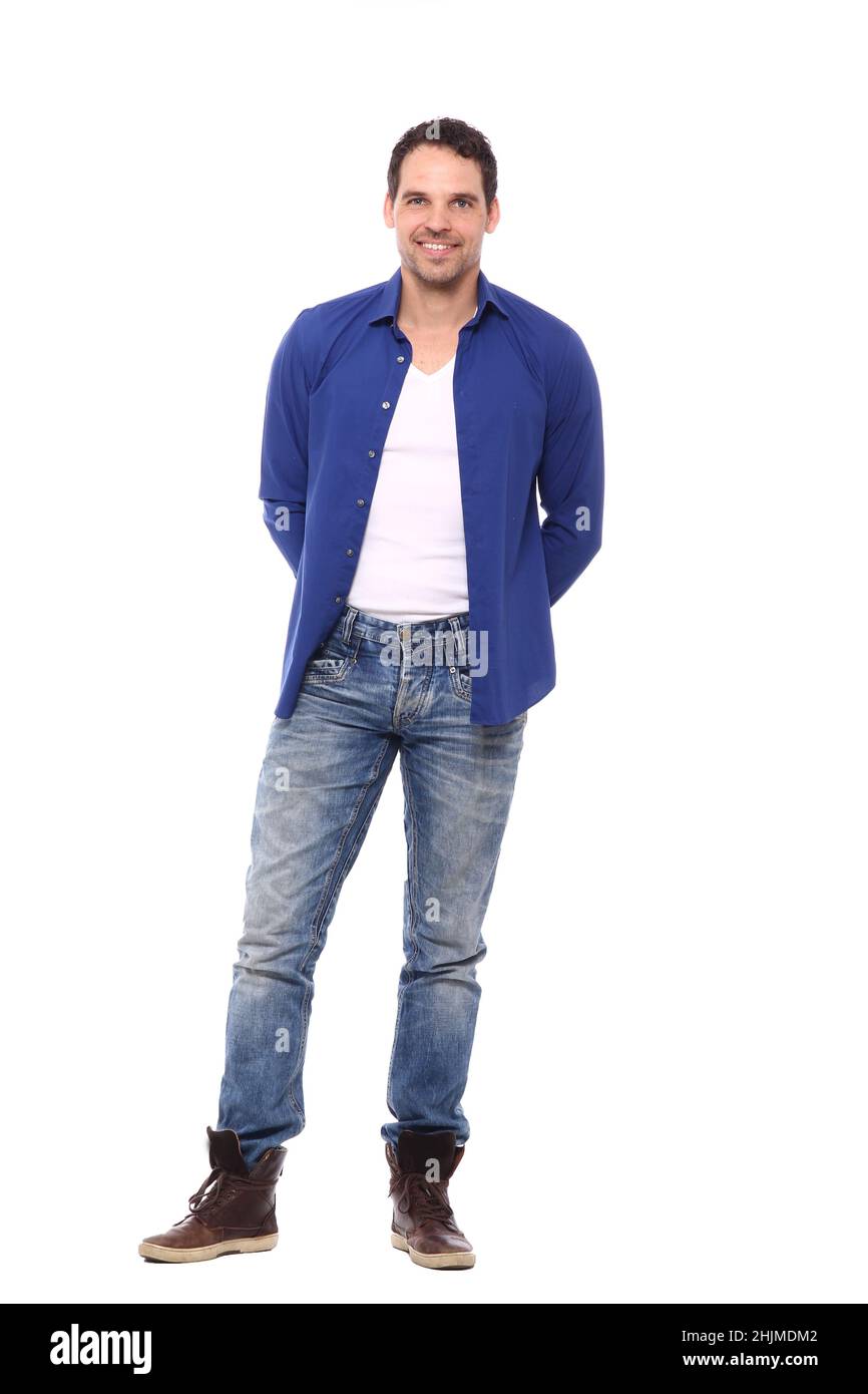 Man standing in front of a white background Stock Photo - Alamy
