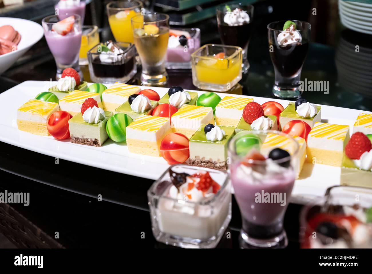 Colorful dessert buffet at the wedding hall Stock Photo - Alamy