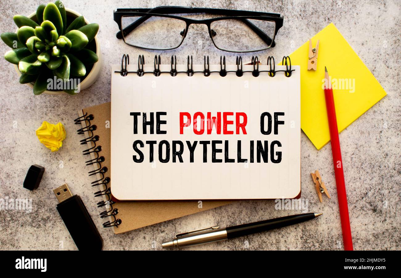 white paper with text THE POWER OF STORYTELLING on a yellow backgroundd ...