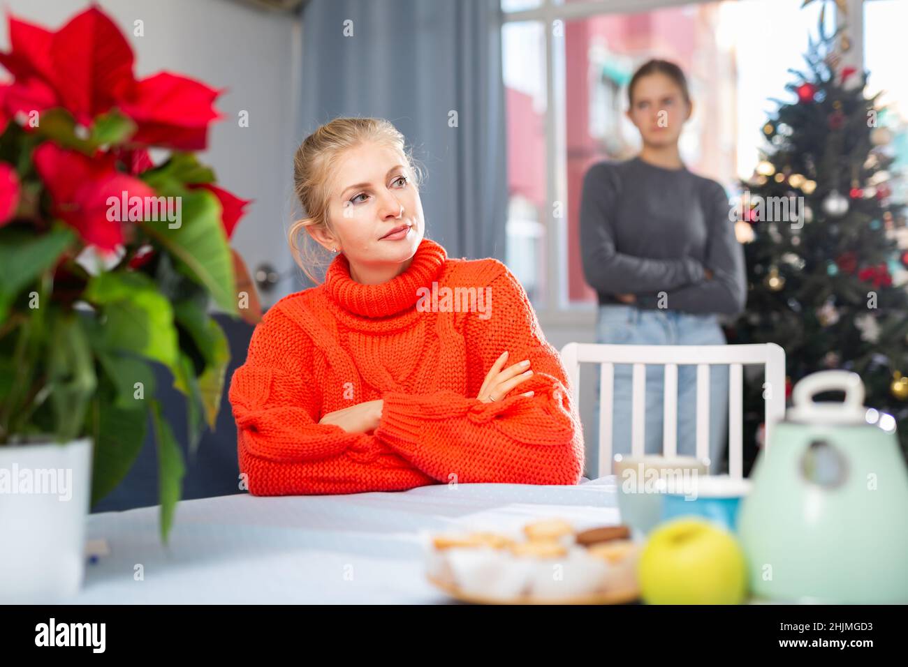 Upset adult woman ignoring her daughter Stock Photo - Alamy