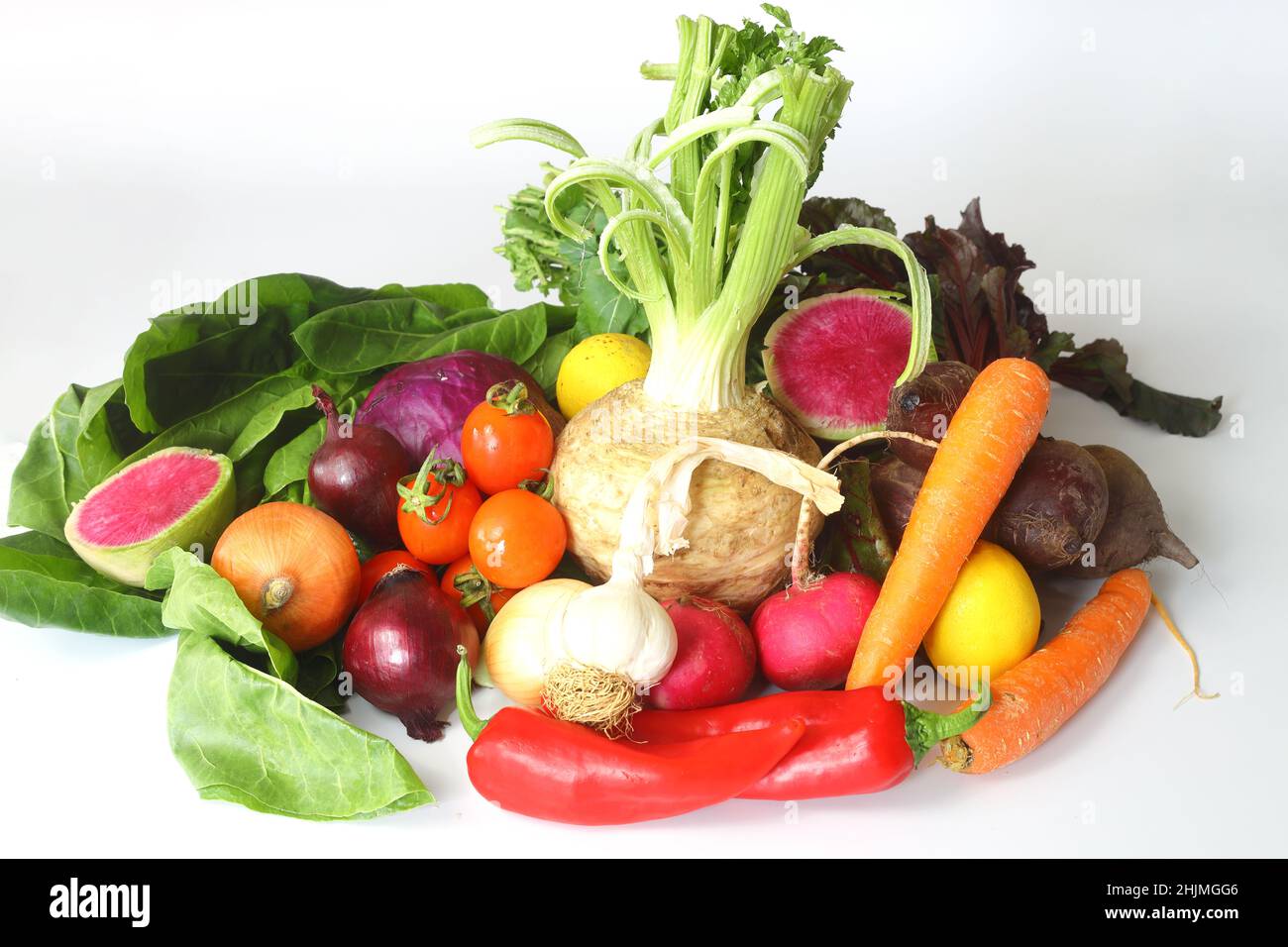 Various raw vegetables are isolated on a white background Stock Photo ...
