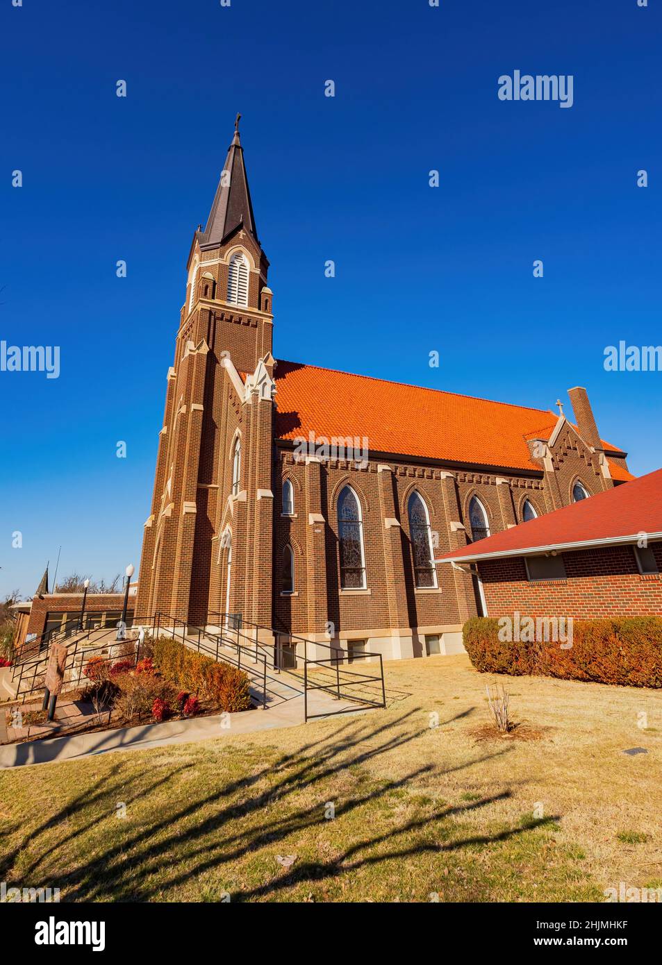 Sunny exterior view of the St Mary Catholic Church at Guthrie, Oklahoma ...