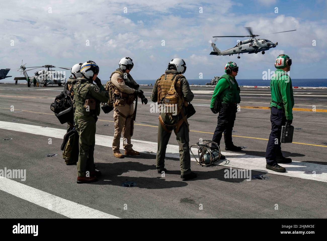 SOUTH CHINA SEA (Jan. 30, 2022) Capt. Amy Bauernschmidt, left ...