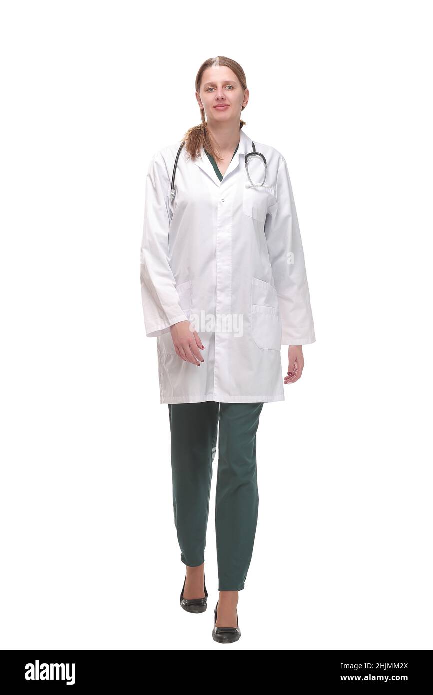 female doctor walking towards the camera smiling isolated Stock Photo ...