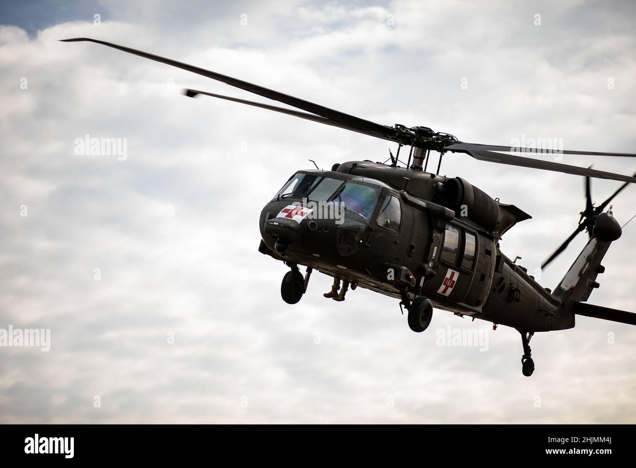 An HH-60M Black Hawk helicopter flys by the Army's Best Medic ...