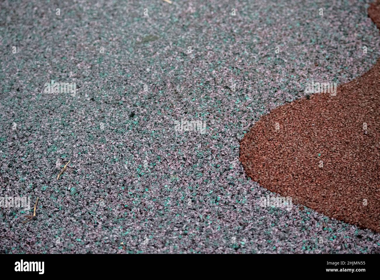 Two colored rubber floor for a play ground Stock Photo - Alamy