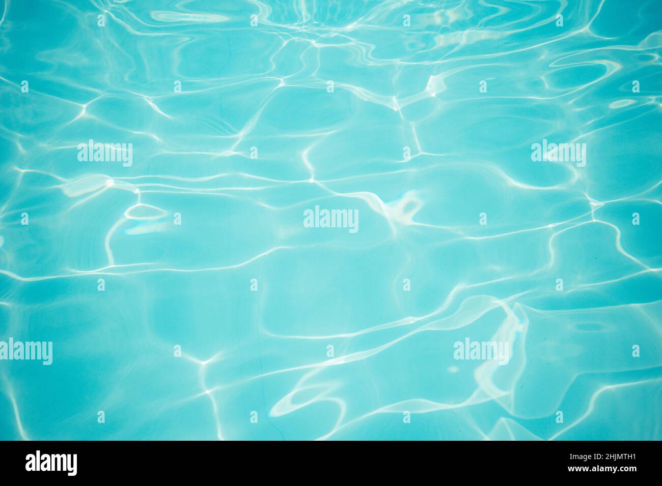 Light blue water pool texture background Stock Photo - Alamy