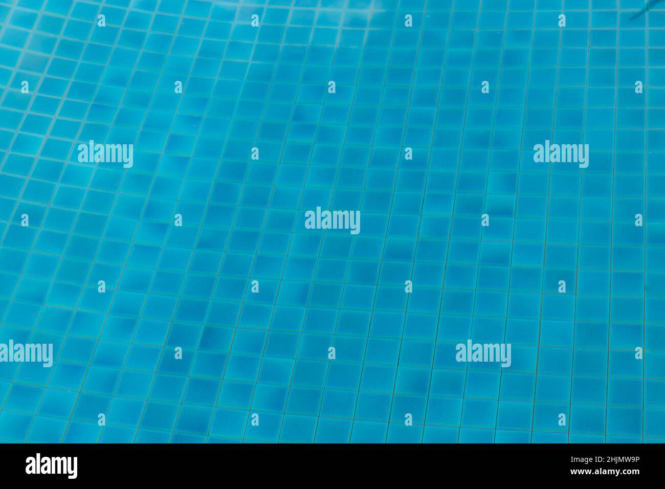 Blue pool water background Stock Photo - Alamy