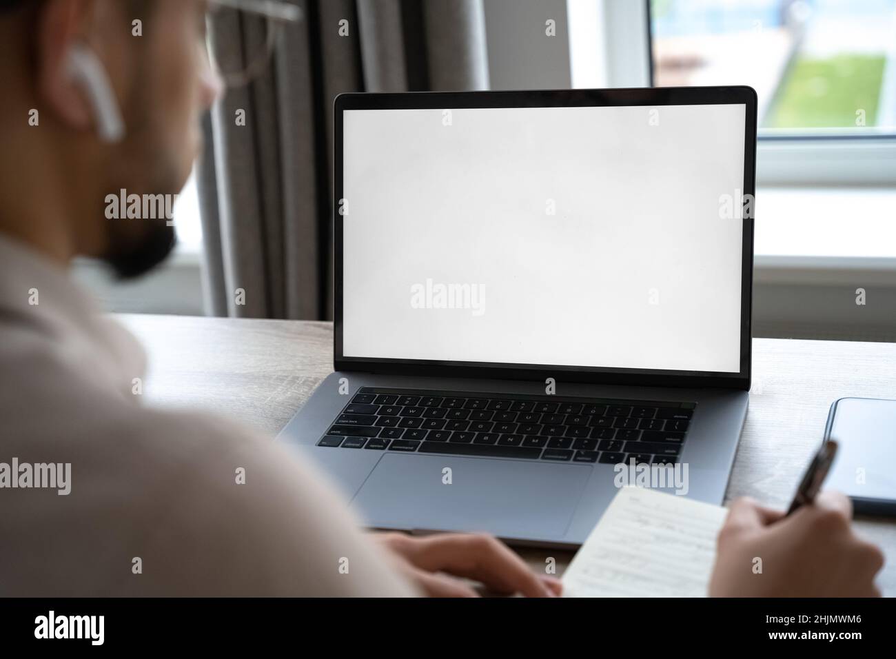 Person using laptop white screen hi-res stock photography and images - Alamy