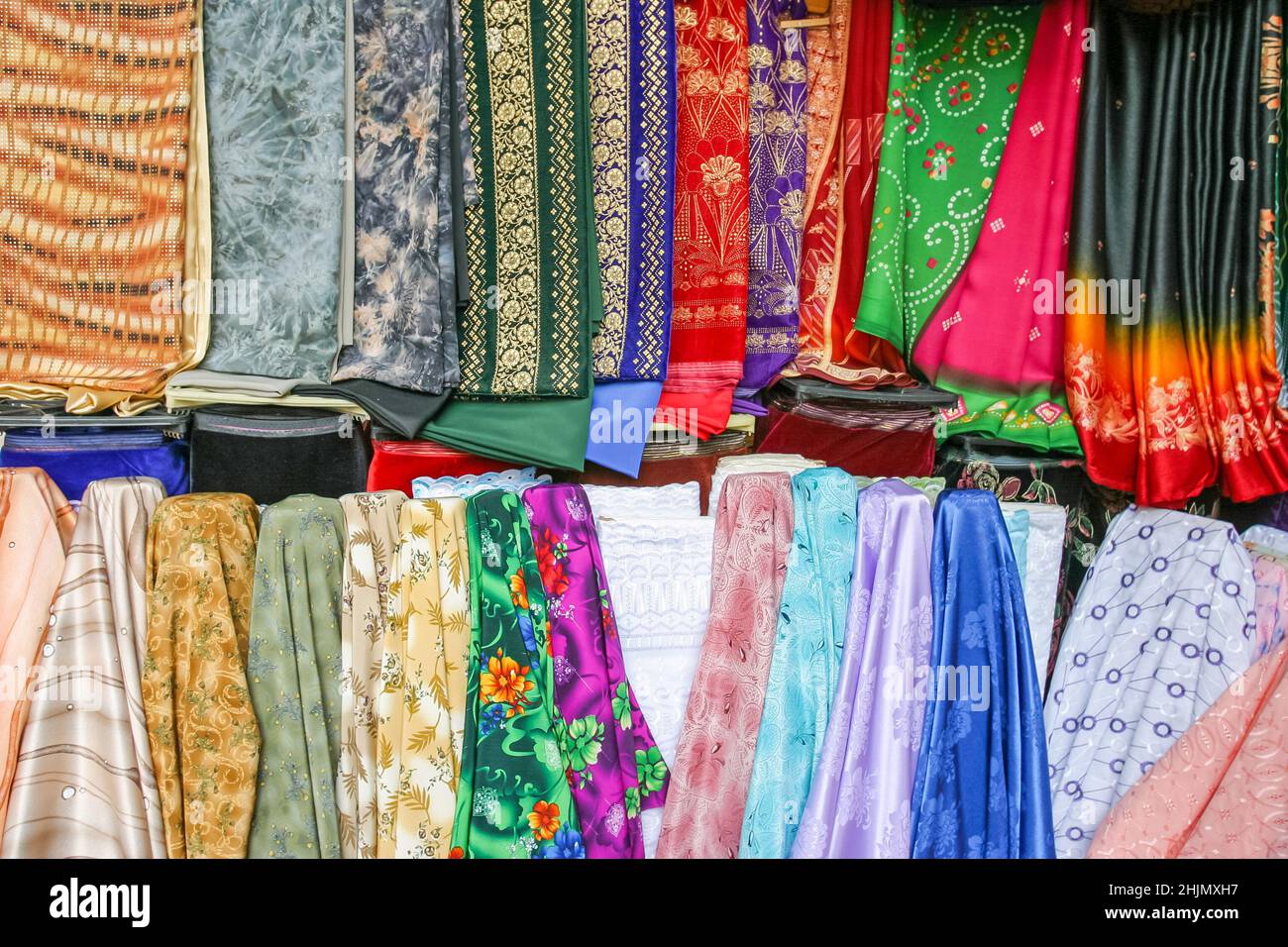 Colourful fabrics on sale at Dubai Textile Souk in Dubai, United Arab ...