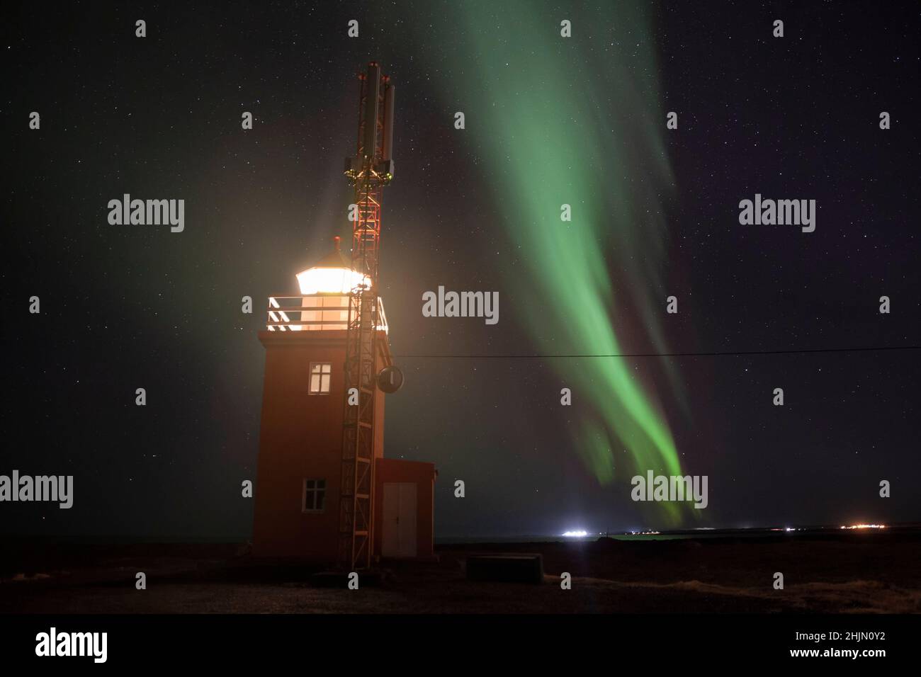 Incredible Aurora Borealis at the Hopsnes Lighthouse in Iceland ...
