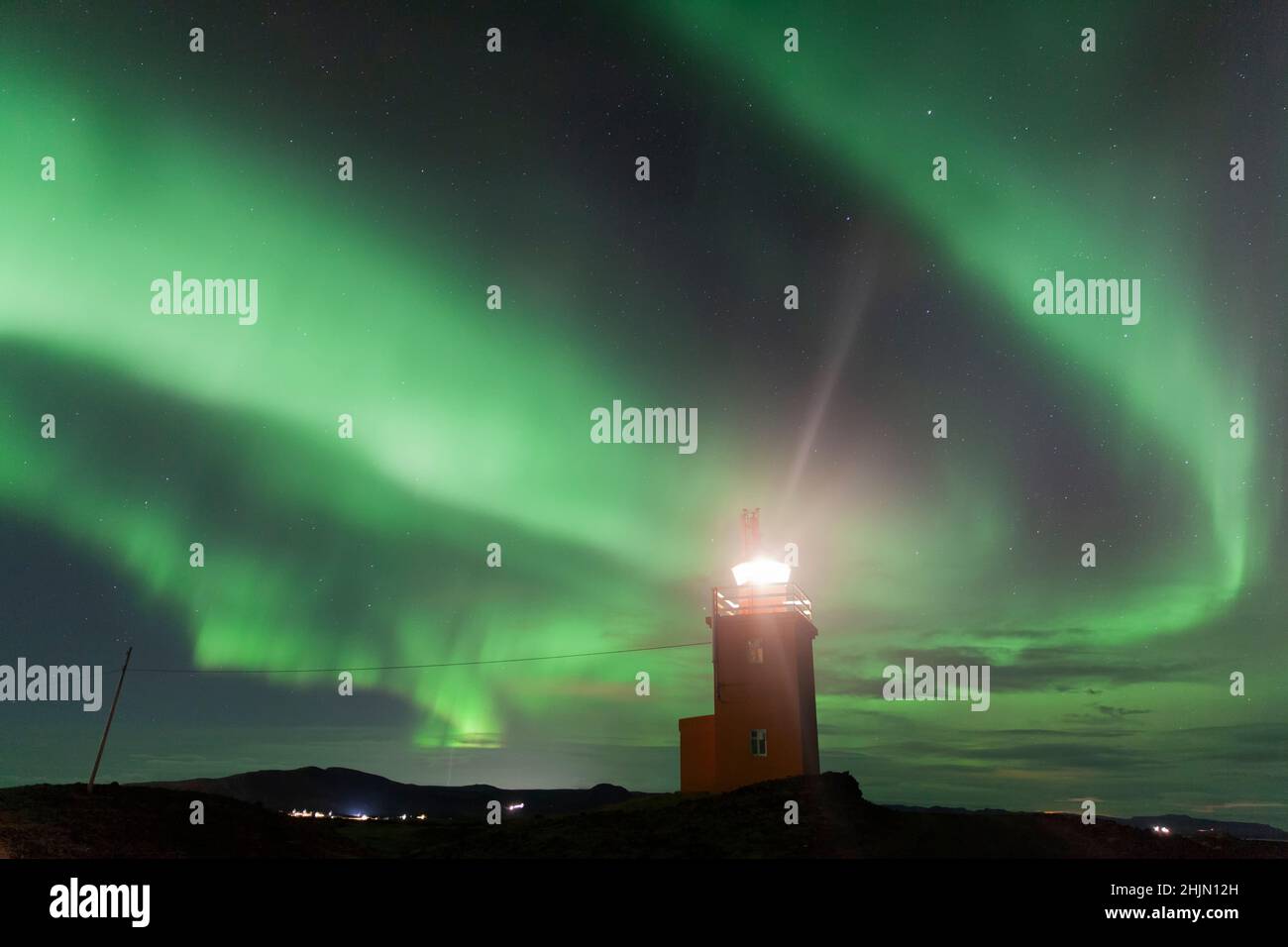 Incredible Aurora Borealis at the Hopsnes Lighthouse in Iceland ...