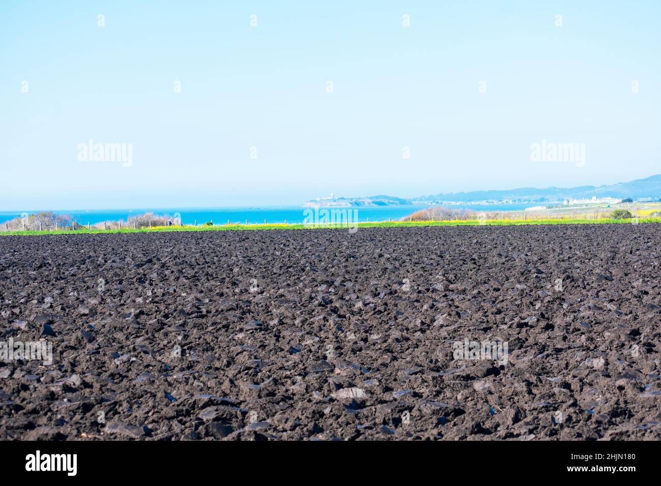 Agricultural field along the California coast, plowed and prepared for ...