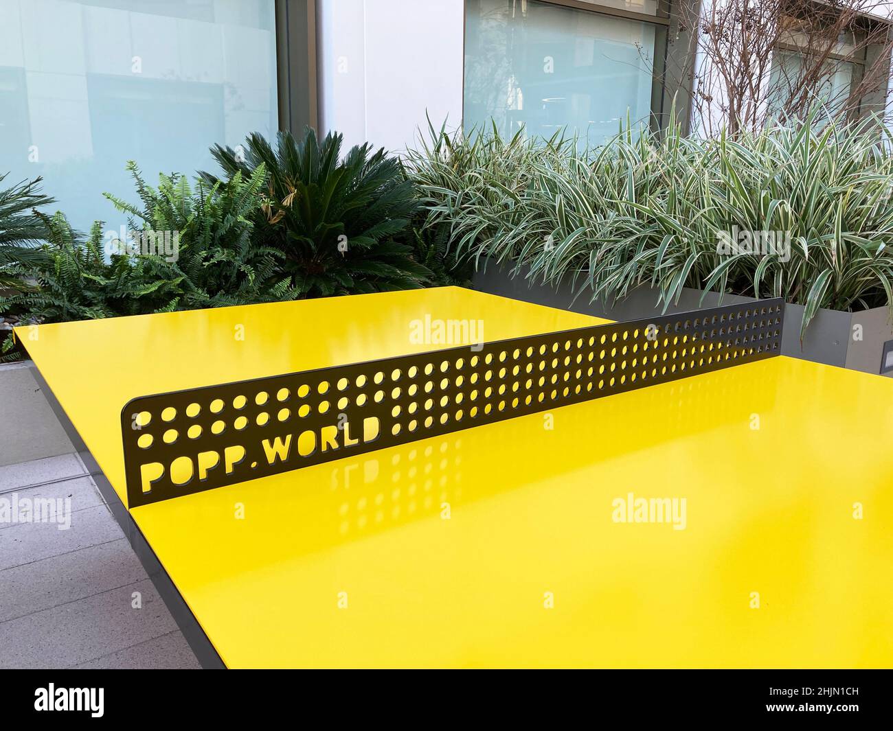 POPP World, public outdoor ping pong table in front of modern office ...