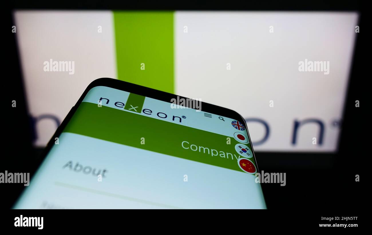 Mobile phone with webpage of British battery company Nexeon Ltd. on ...