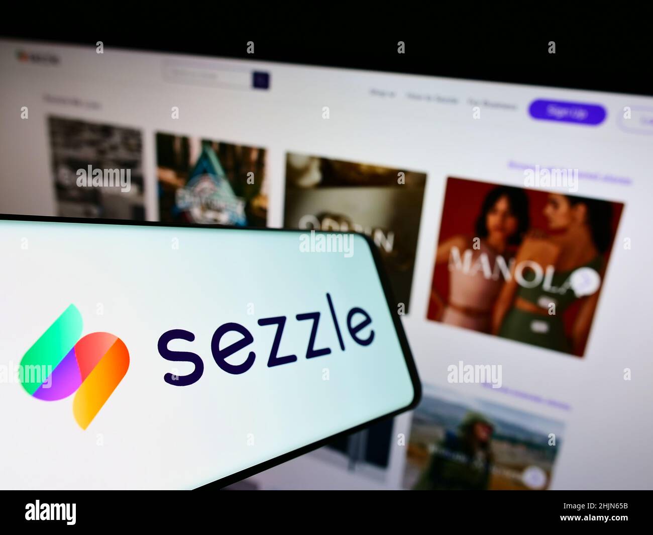 Smartphone with logo of US financial technology company Sezzle Inc. on ...