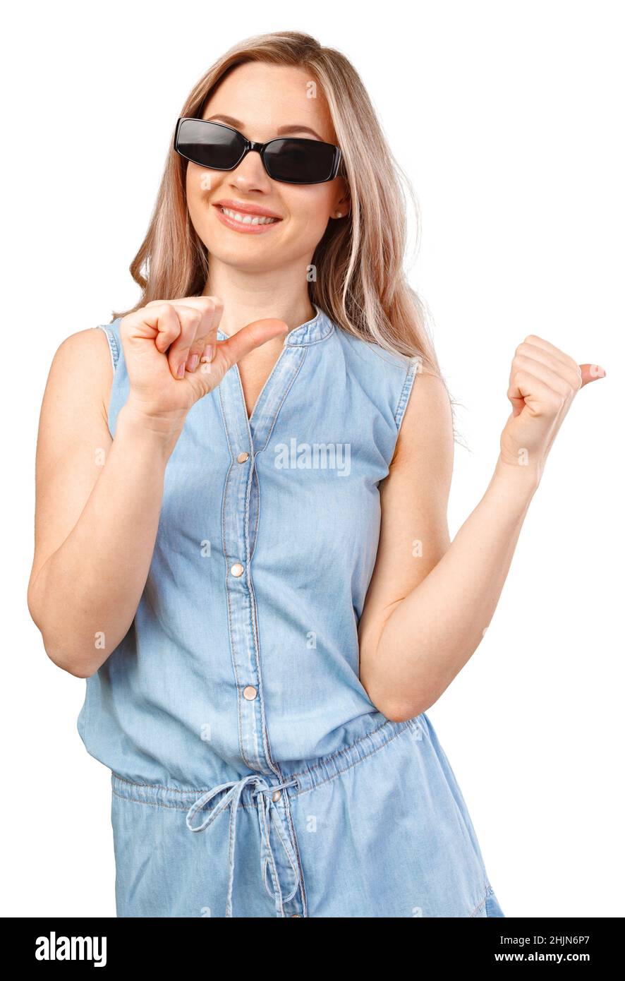 Young woman pointing at your product isolated on white background Stock ...