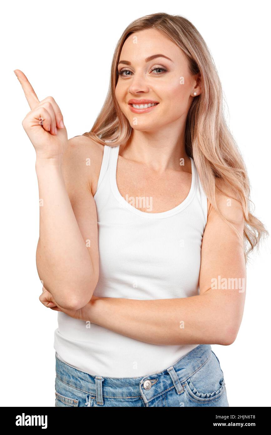 Young woman pointing at your product isolated on white background Stock ...