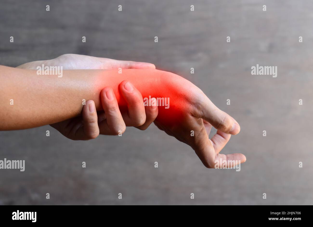 Inflammation of Asian young man wrist joint and hand. Concept of joint ...