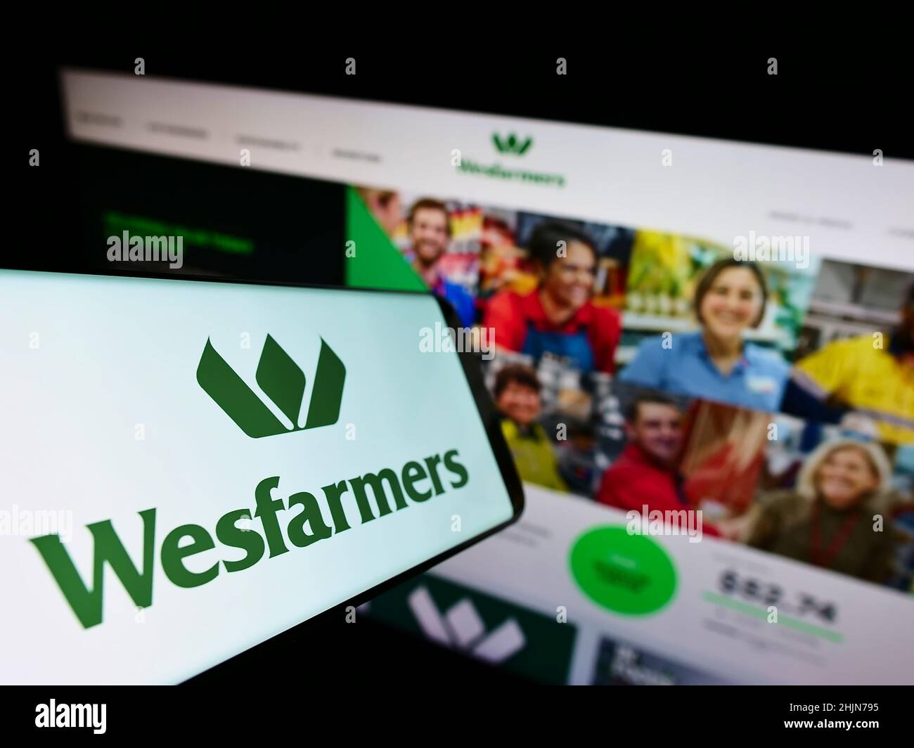 Mobile phone with logo of Australian conglomerate Wesfarmers Limited on ...