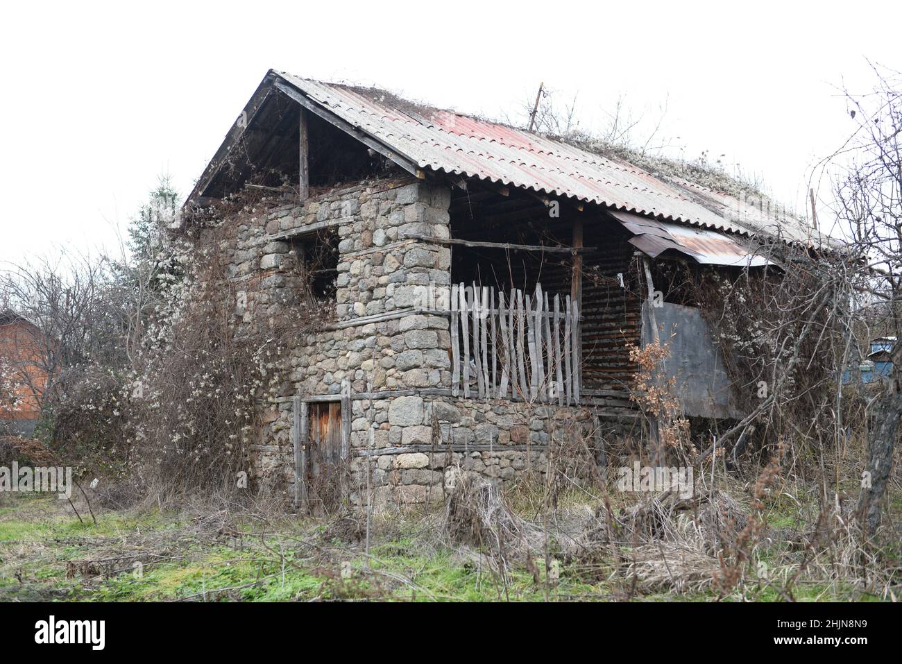 Abandoned old family house with a rusted roof isolated in nature Stock ...