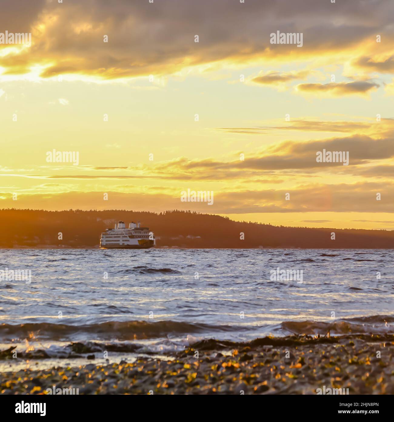 A yacht on the Puget sound during a beautiful sunrise in the morning in ...