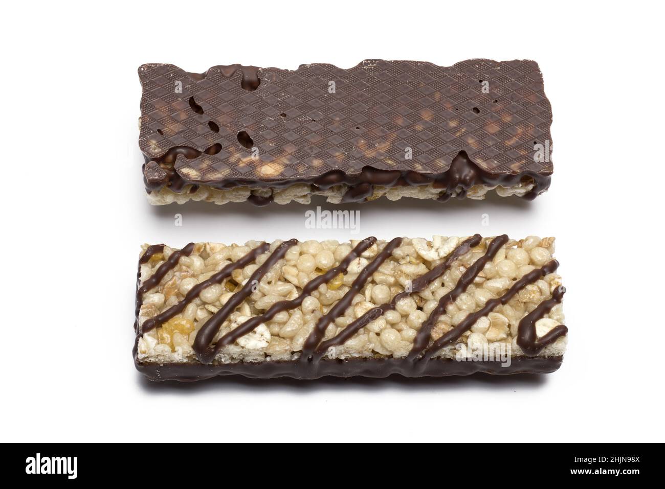 Close up of two chocolate banana cereal bars seen from two sides on ...