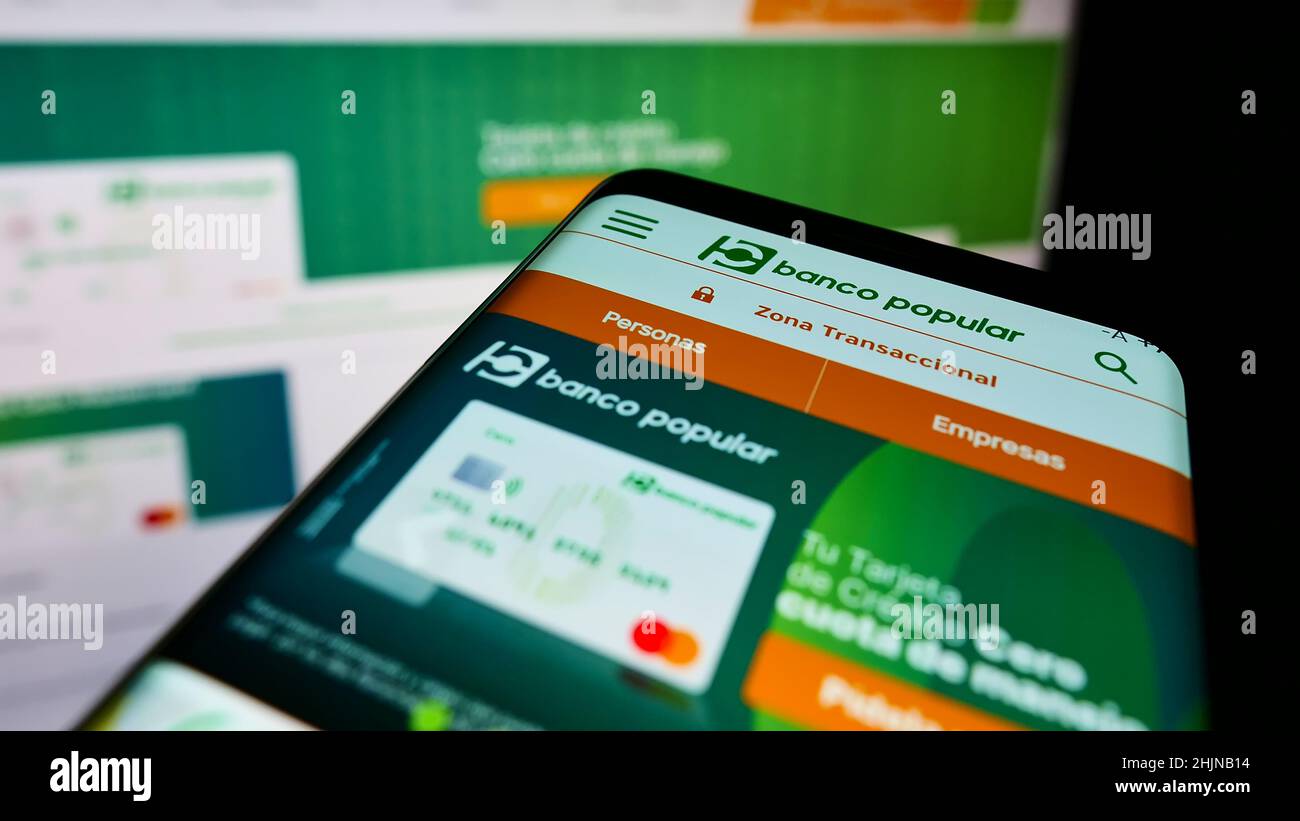 Smartphone with business web page of Colombian banking company Banco ...