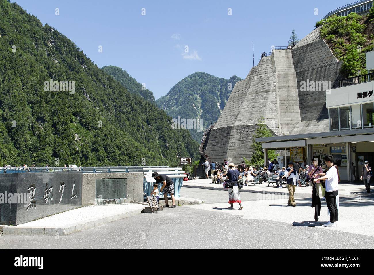 Nagano, Japan, 2021-23-07 , people preparing to cross the Kurobe dam in ...