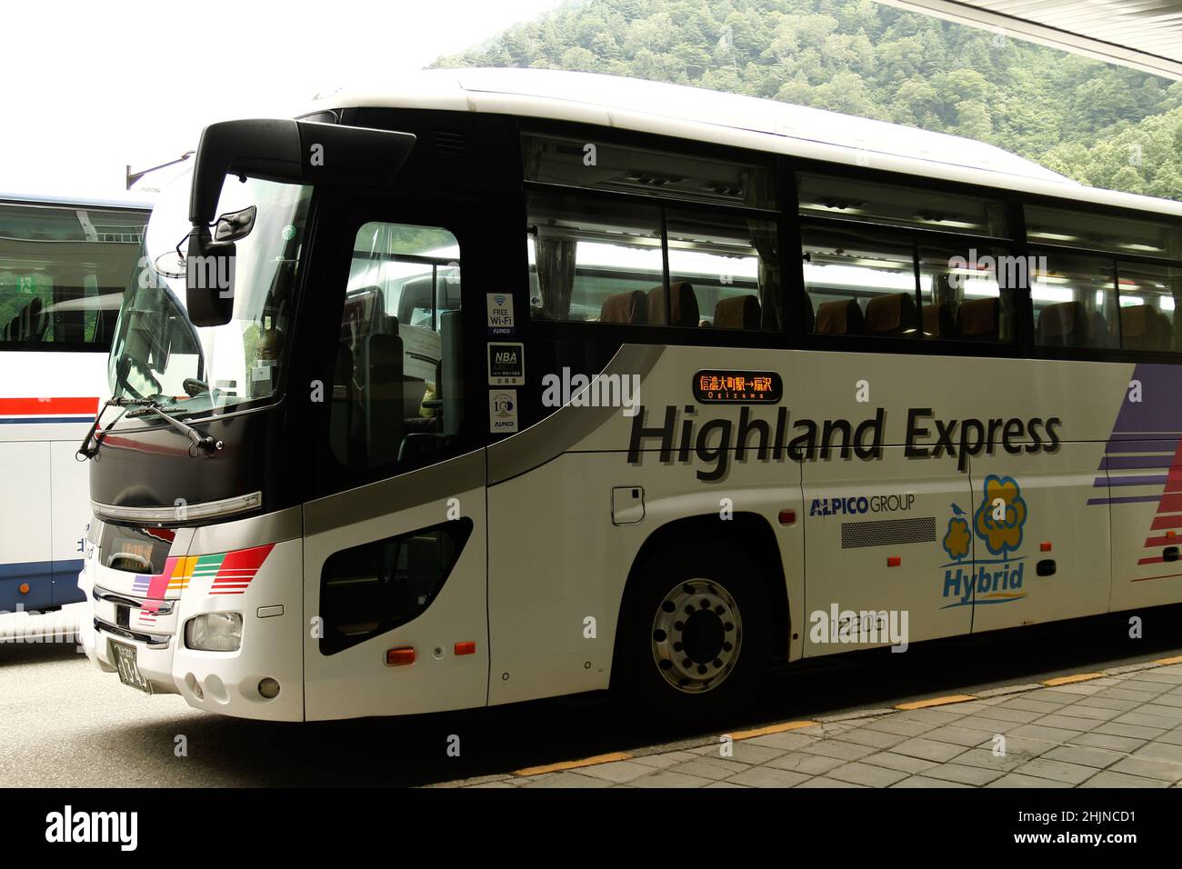 Nagano, Japan, 2021-23-07 , Buses bringing tourists to the Kurobe dam ...