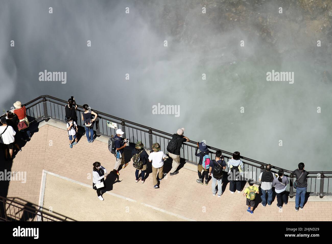 Nagano, Japan, 2021-23-07 , people watching the water jets of the dam ...
