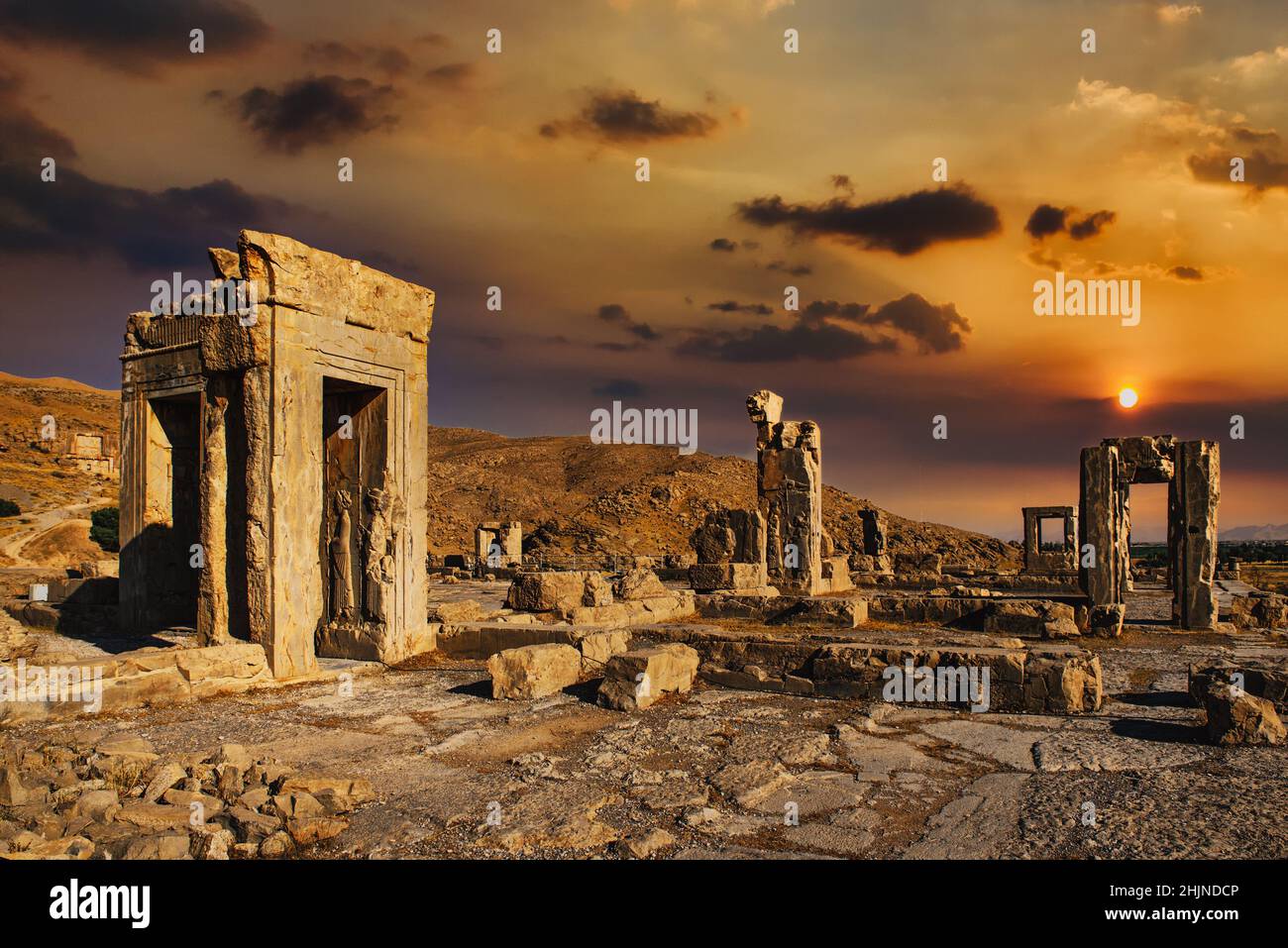 Beautiful yellow sunset at the ancient Palace of Xerxes in Persepolis ...