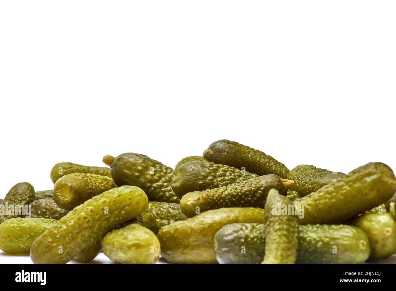 Tasty Whole green cornichons isolated on a white background Stock Photo ...