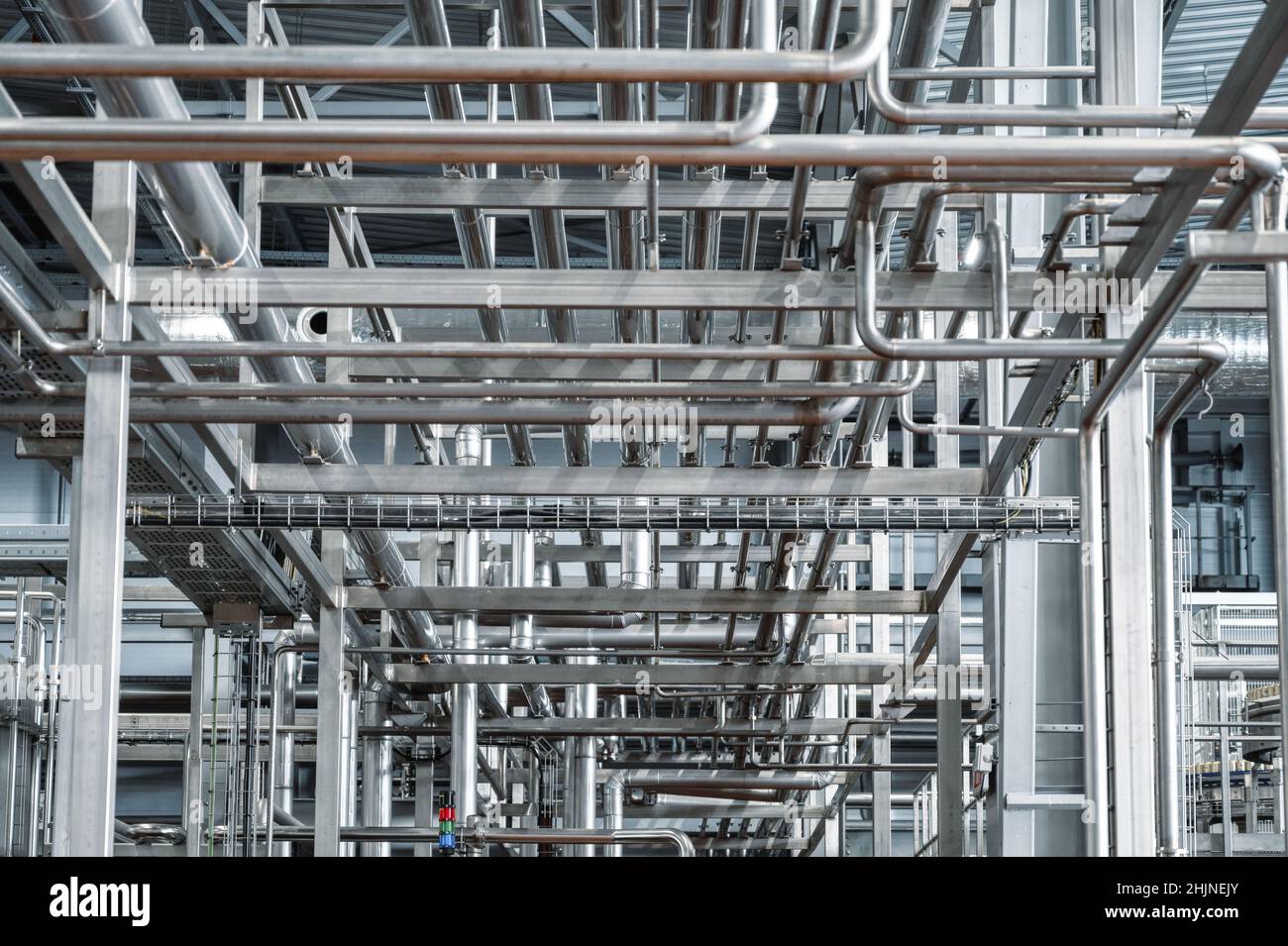 Lots of stainless steel piping Stock Photo - Alamy